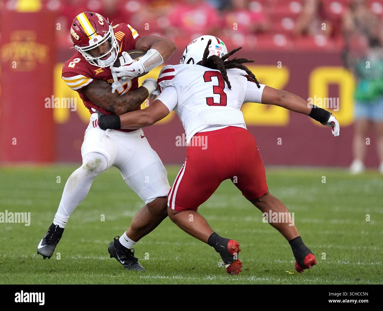 Iowa State running back Dylan Lee (2) tries to elude South Dakota ...