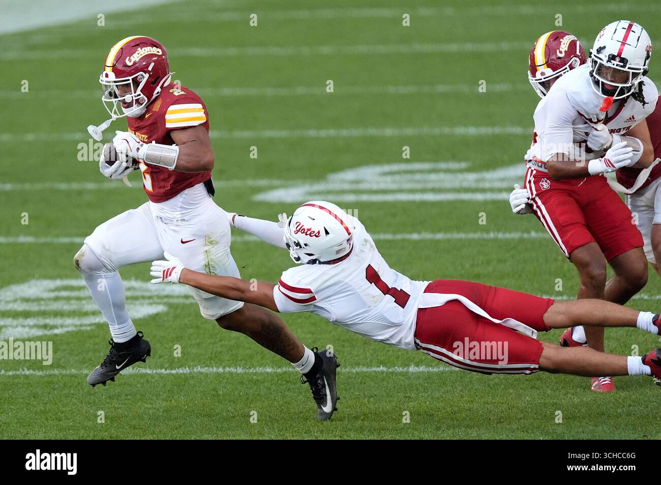 Iowa State running back Dylan Lee (2) runs for a first down as he ...