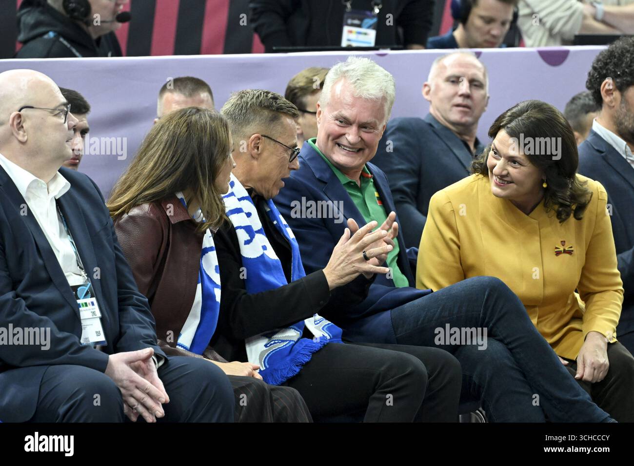 Finland's President Alexander Stubb (C) and his wife Suzanne Innes ...