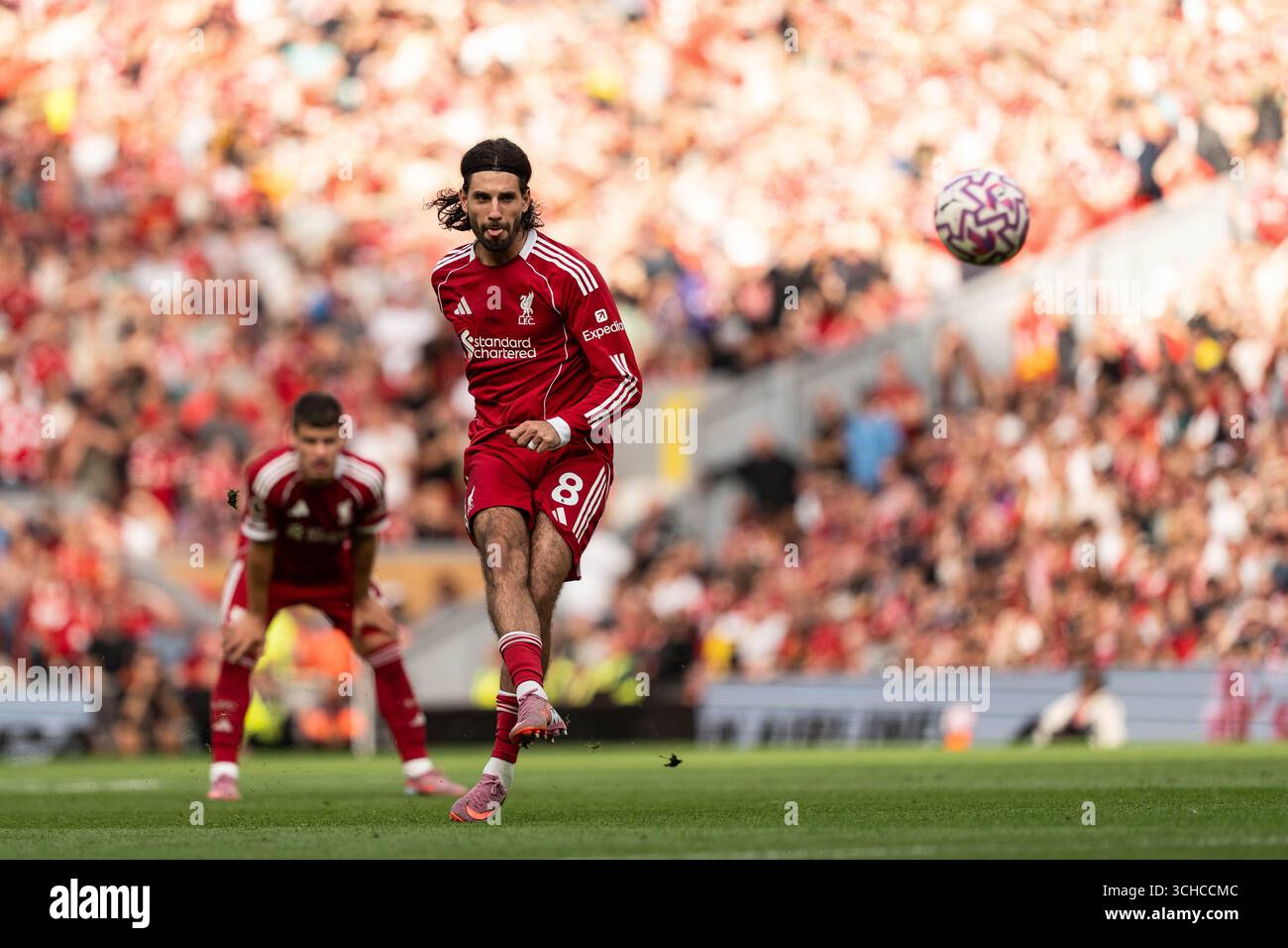 Liverpool's Dominik Szoboszlai scores from a free kick during the ...