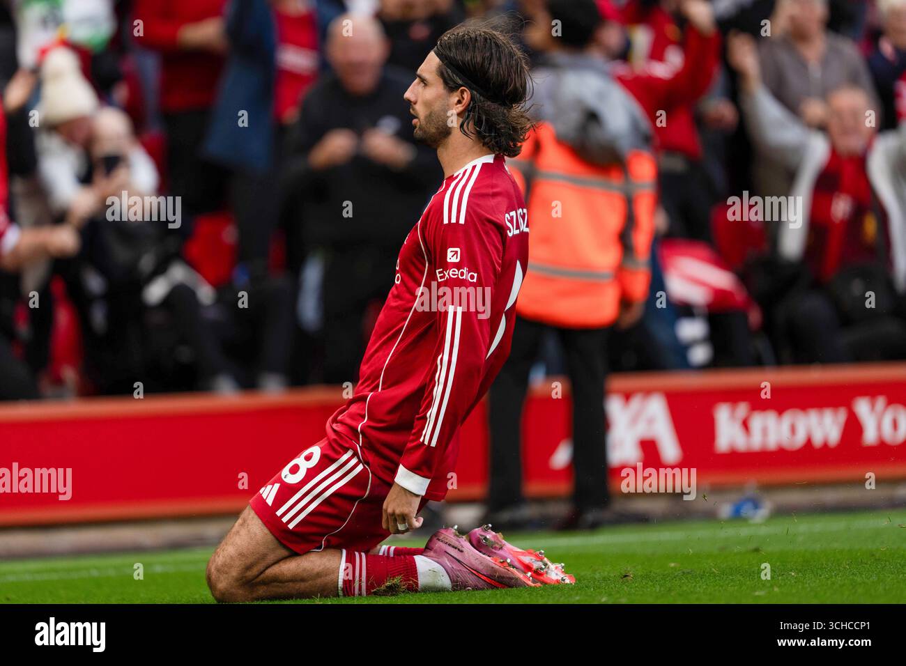 Liverpool's Dominik Szoboszlai celebrates after scoring from a free ...