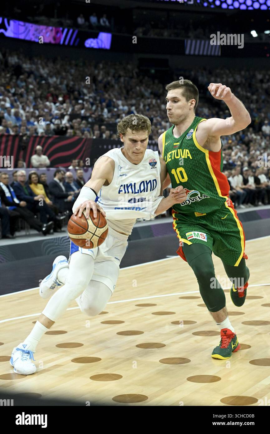 Finland's Lauri Markkanen (L) and Lithuania's Azuolas Tubelis during the basketball FIBA ...