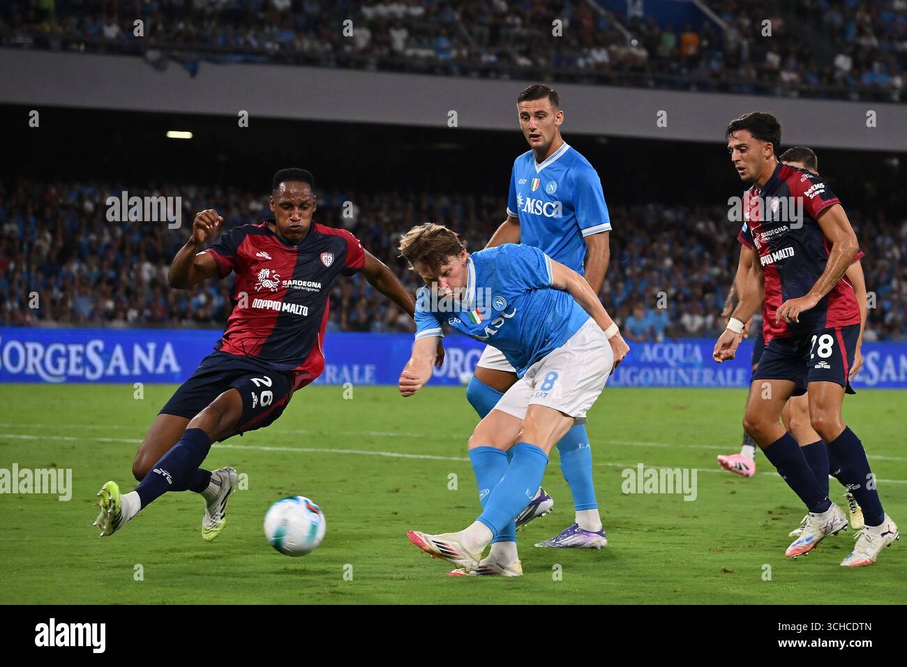 Yerry Mina of Cagliari Calcio and Scott Mctominay of S.S.C. Napoli are ...