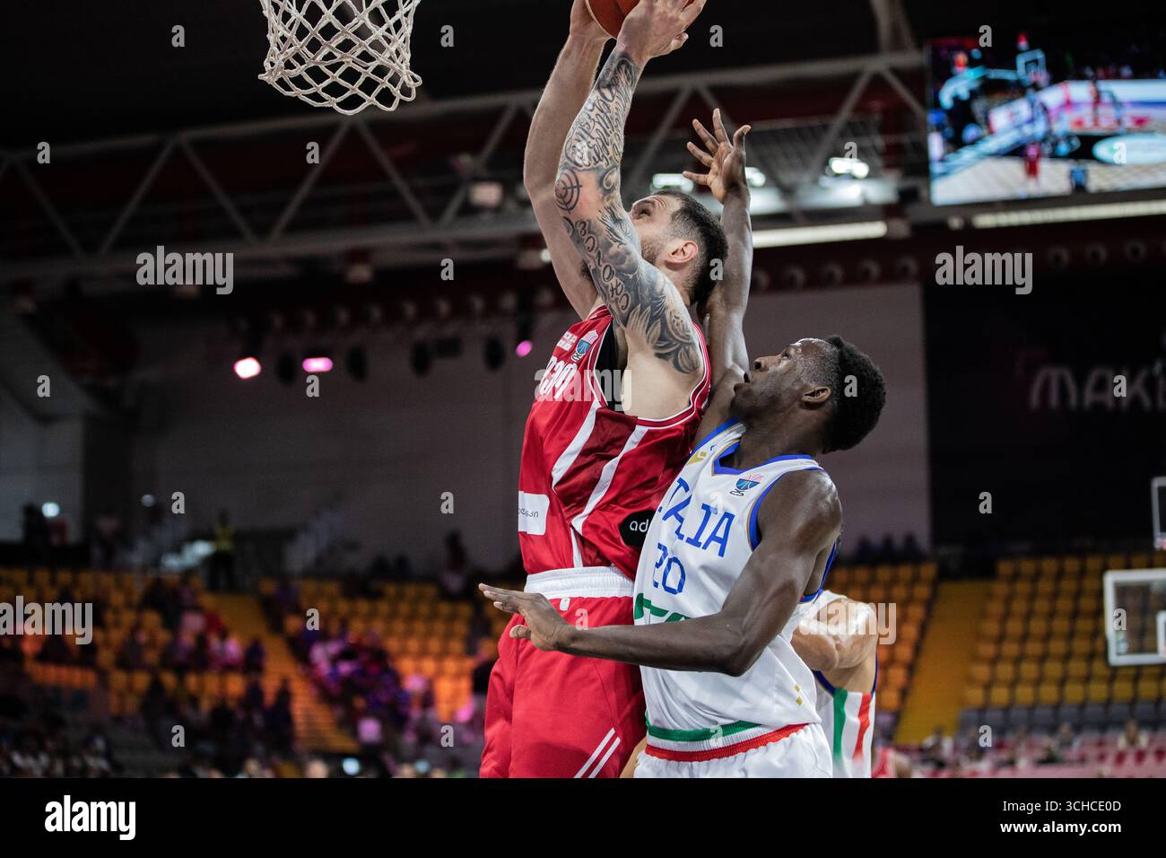 Alexander Mamukelashvili (L) of Georgia and Saliou Niang (R) of Italy ...