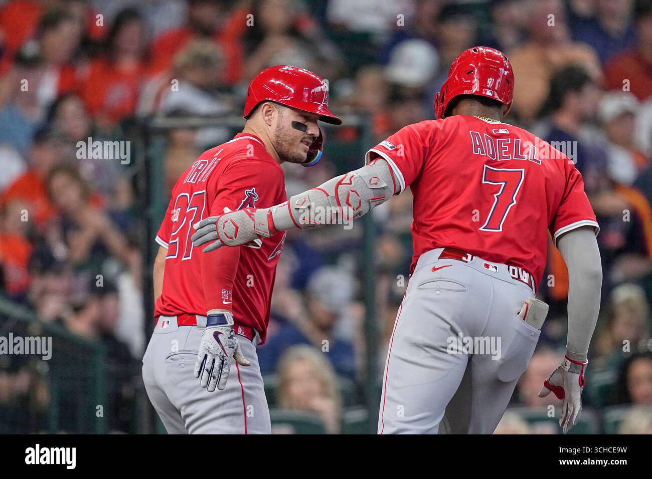 Los Angeles Angels' Jo Adell (7) celebrates with Mike Trout (27) after ...