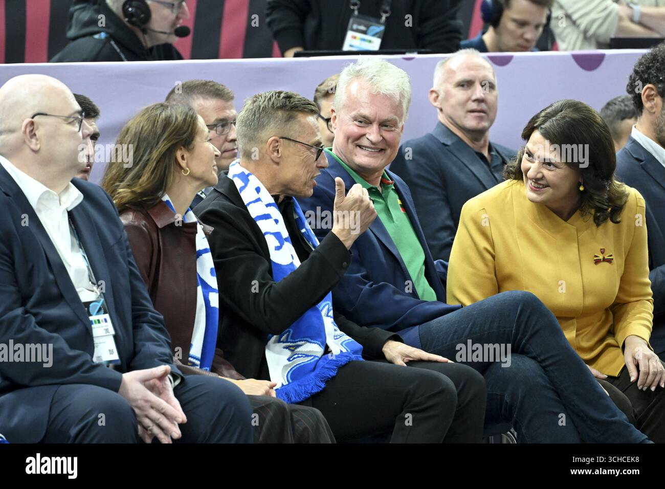Finland's President Alexander Stubb (C) and his wife Suzanne Innes ...