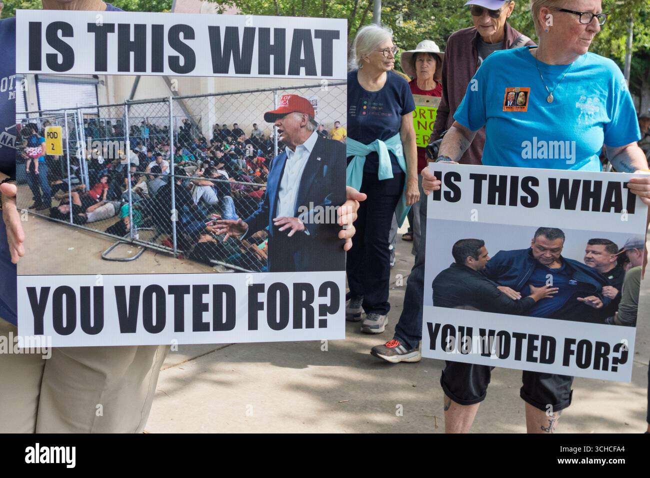 Asheville, USA. 1st September 2025. Protesters hold signs on Labor Day ...