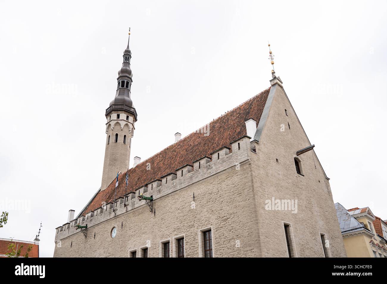 Historic Tallinn Town Hall with distinctive spire and medieval ...