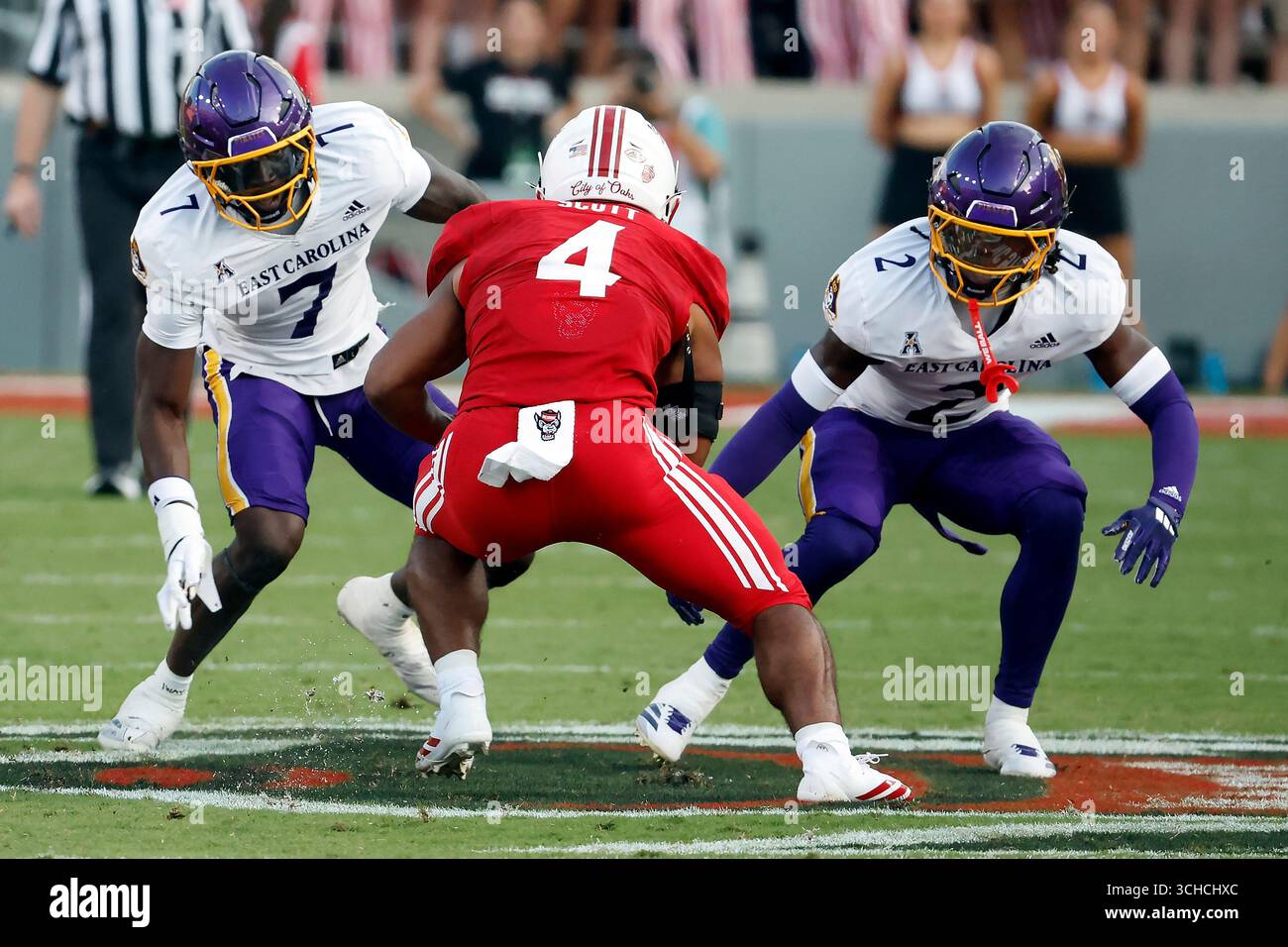 North Carolina State's Jayden Scott (4) tries to run the ball between ...