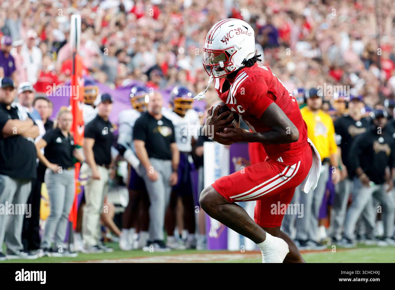 North Carolina State's CJ Bailey (11) scores a touchdown against East ...