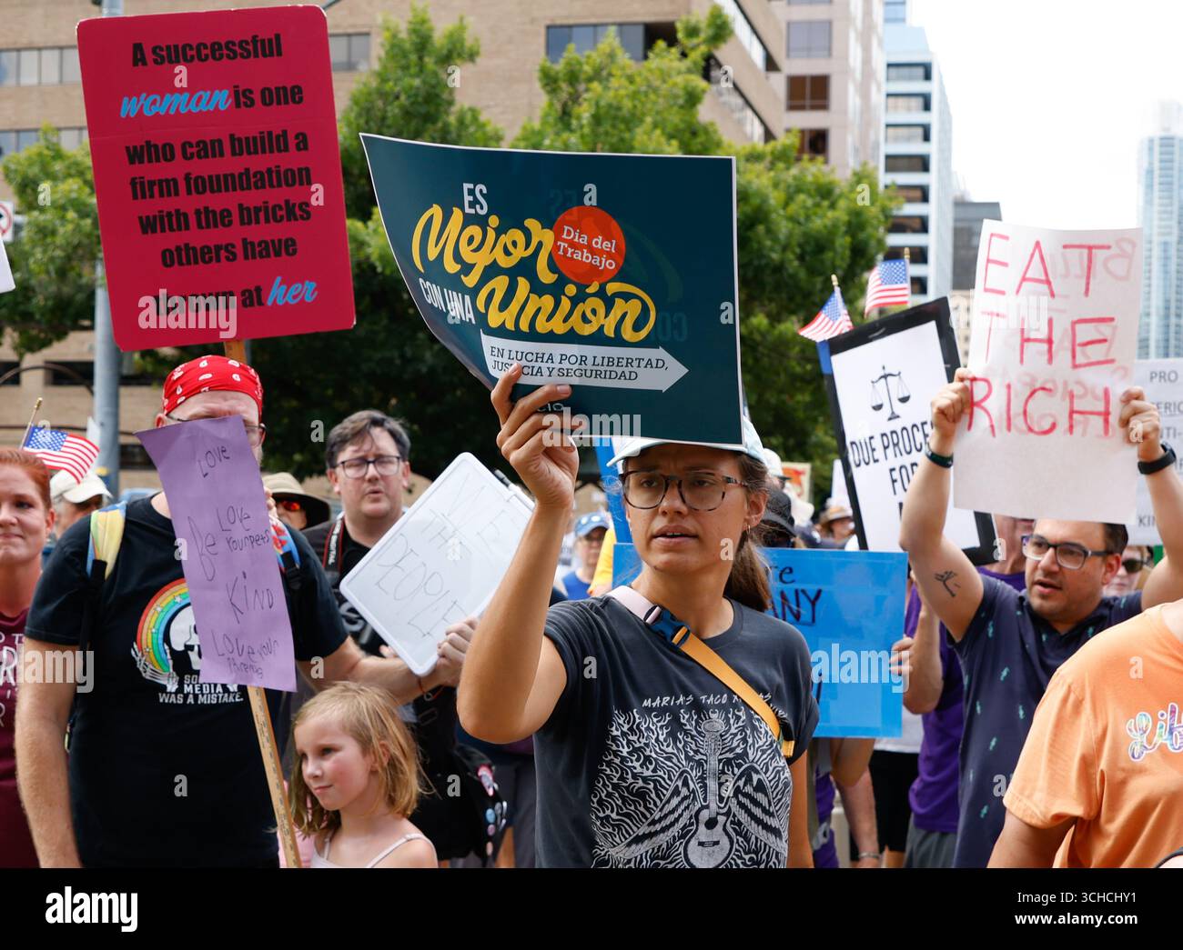 Hundreds gathered to protest President Donald Trump during the Memorial ...