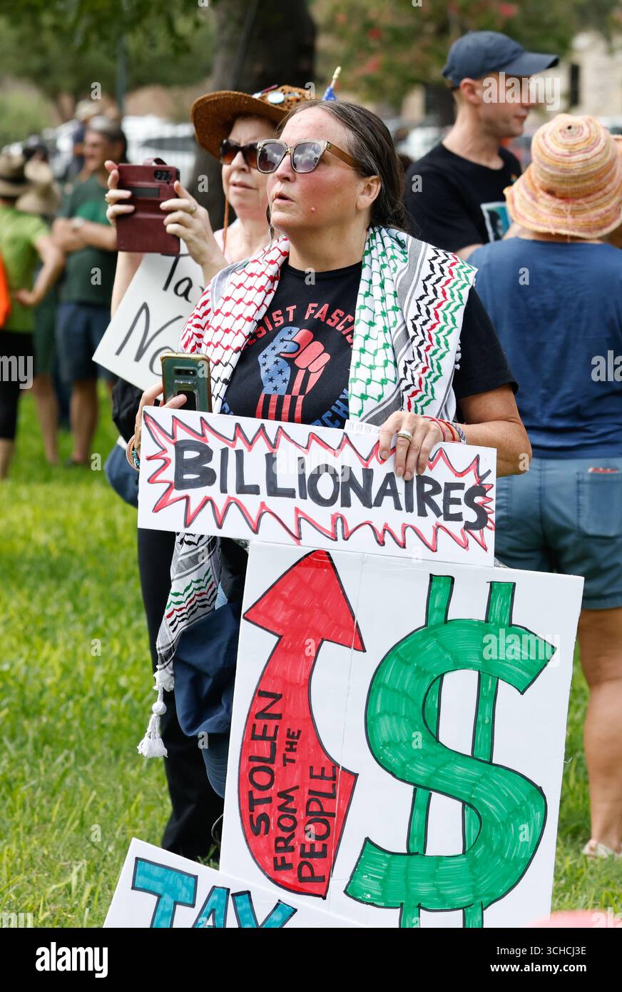 Hundreds gathered to protest President Donald Trump during the Memorial ...