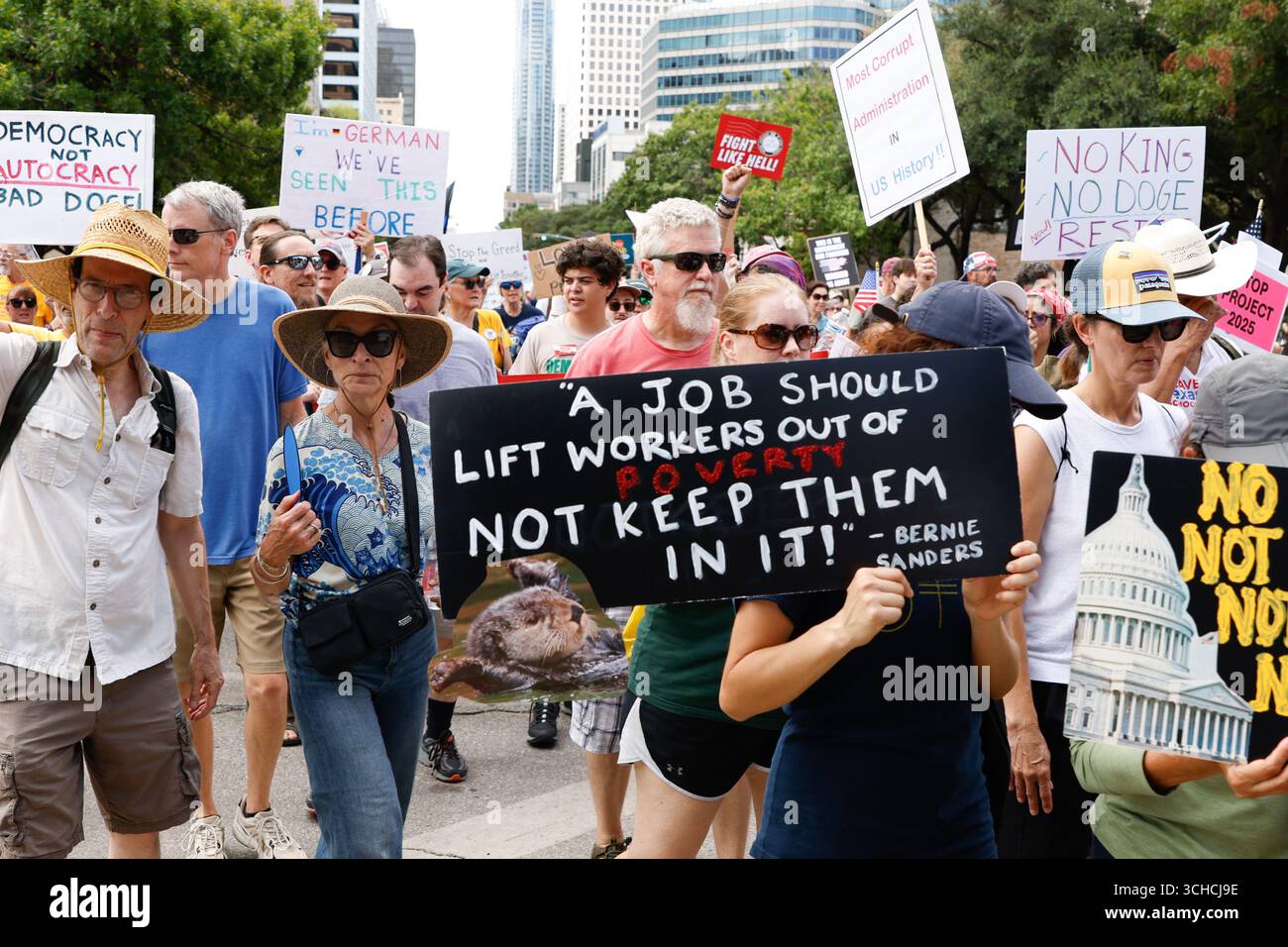 Hundreds gathered to protest President Donald Trump during the Memorial ...