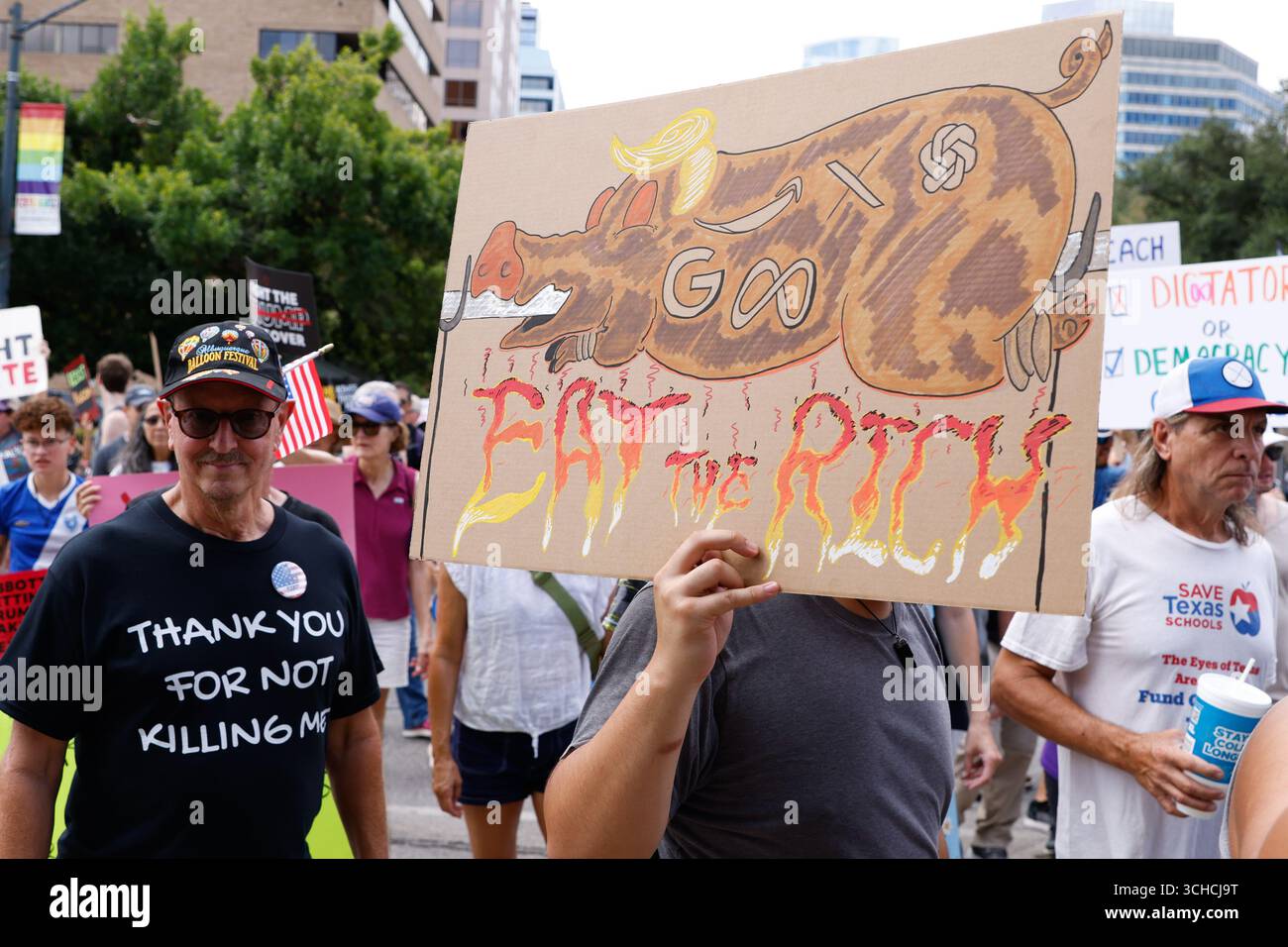Hundreds gathered to protest President Donald Trump during the Memorial ...