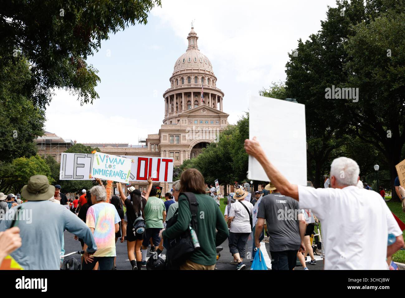 Hundreds gathered to protest President Donald Trump during the Memorial ...