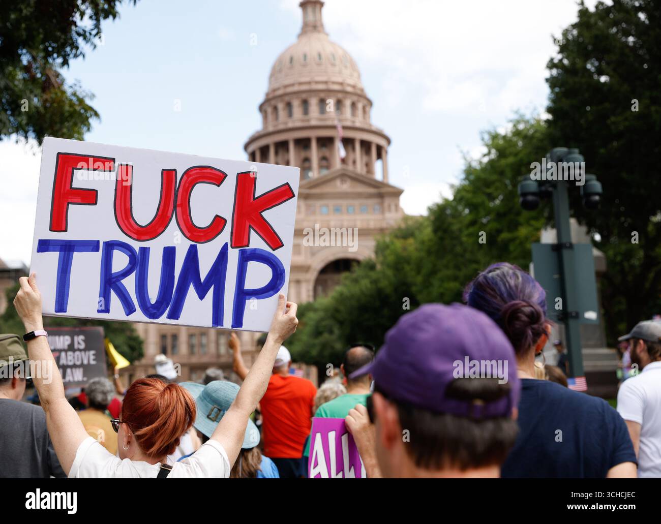 Hundreds gathered to protest President Donald Trump during the Memorial ...