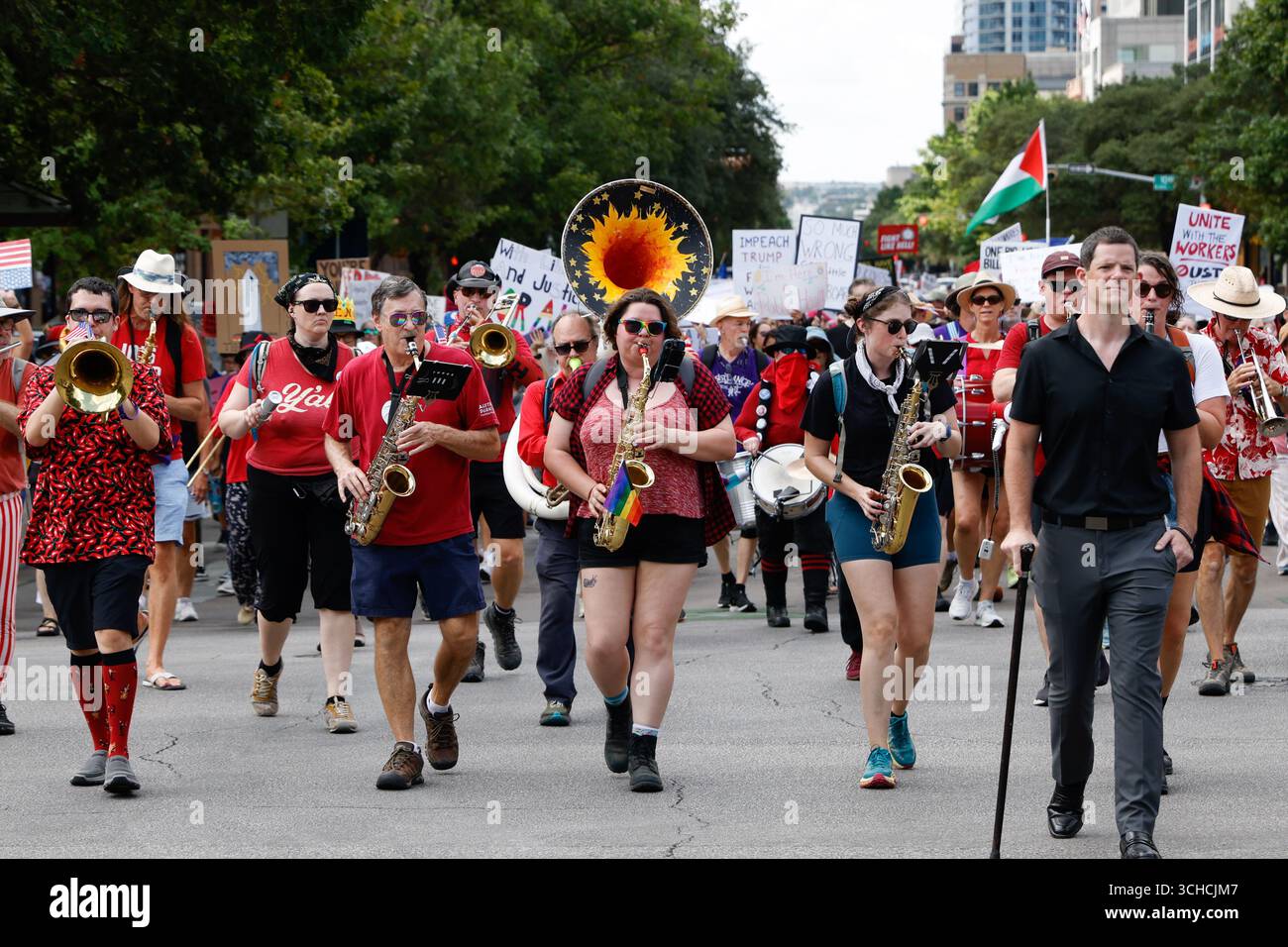 Hundreds gathered to protest President Donald Trump during the Memorial ...