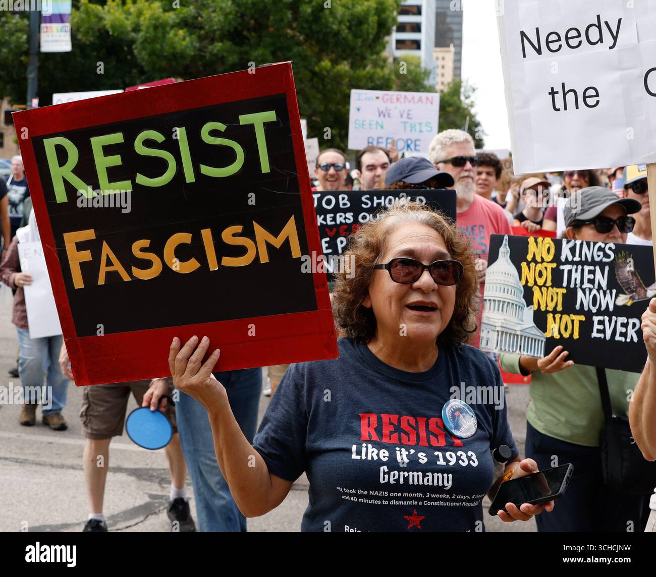 Hundreds gathered to protest President Donald Trump during the Memorial ...