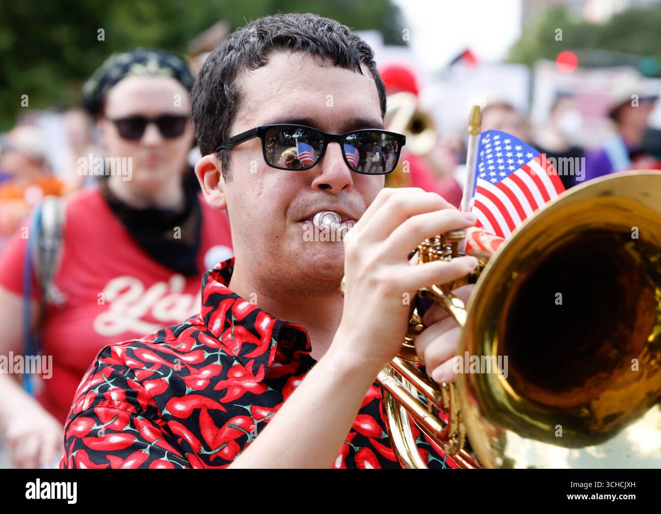 Hundreds gathered to protest President Donald Trump during the Memorial ...