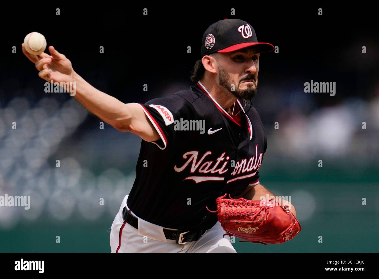 Washington Nationals relief pitcher Cole Henry throws to the Miami ...