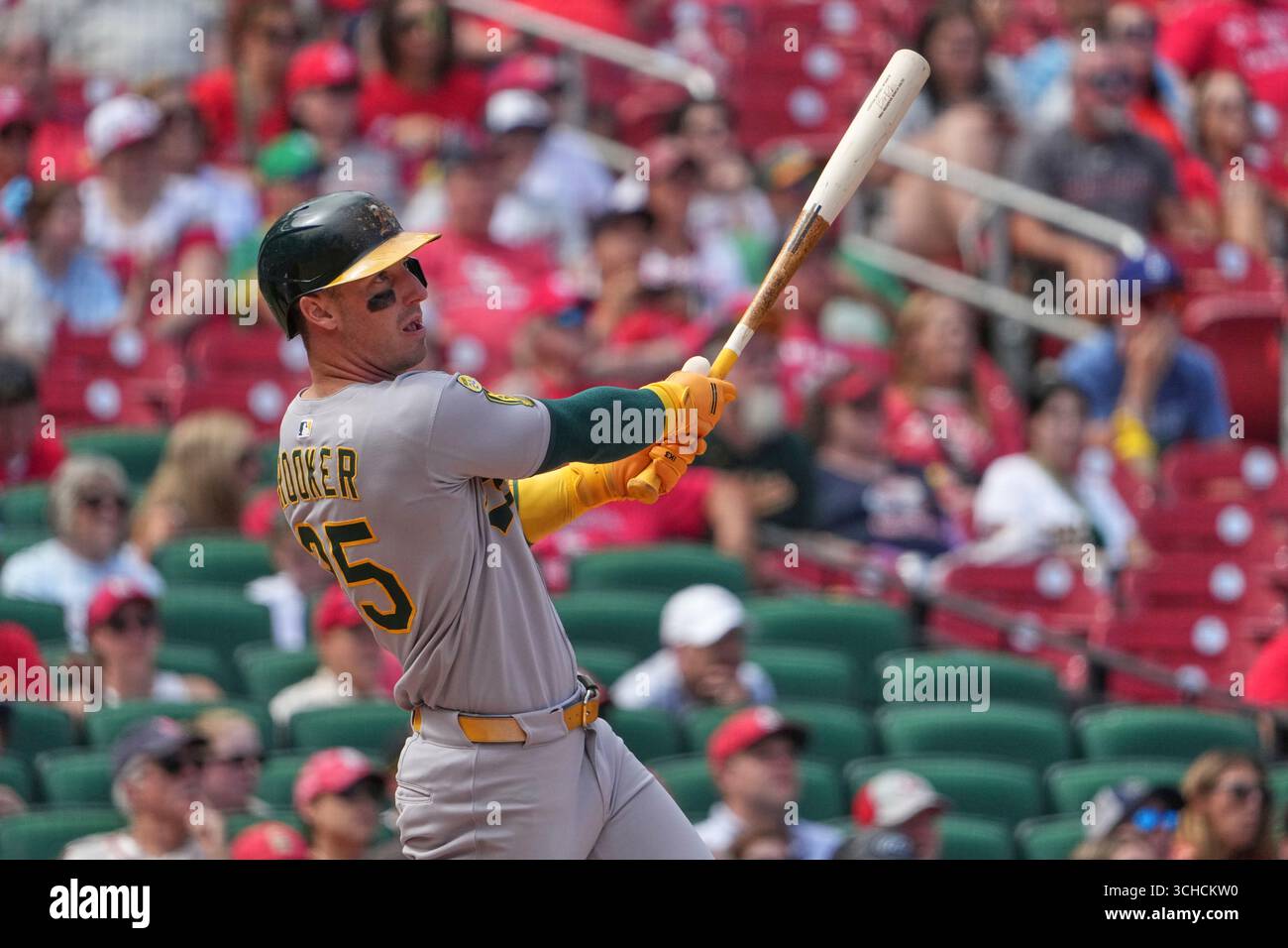 Athletics' Brent Rooker follows through on a ground-rule double to ...