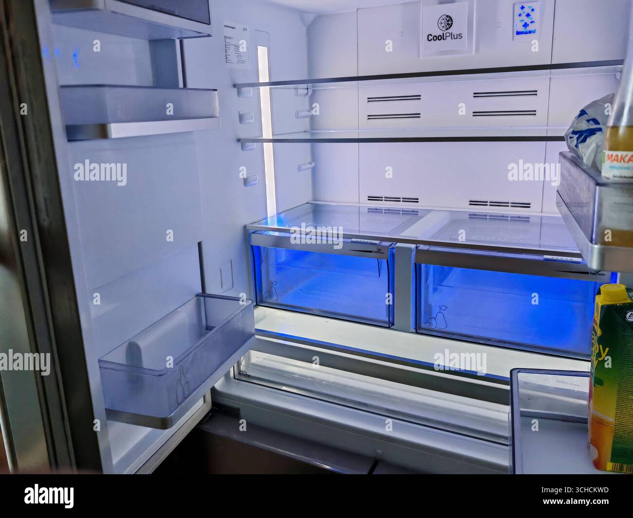 an empty refrigerator or fridge, kitchen equipment for cooling food and ...