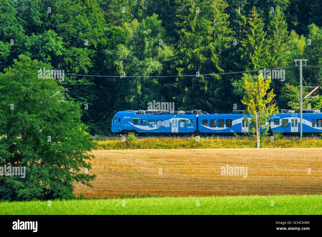Bavaria, Germany - August 24, 2025: A blue regional train from Arverio ...
