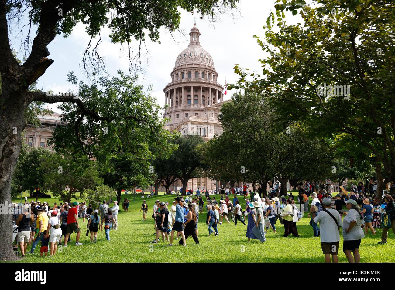 Hundreds gathered to protest President Donald Trump during the Memorial ...
