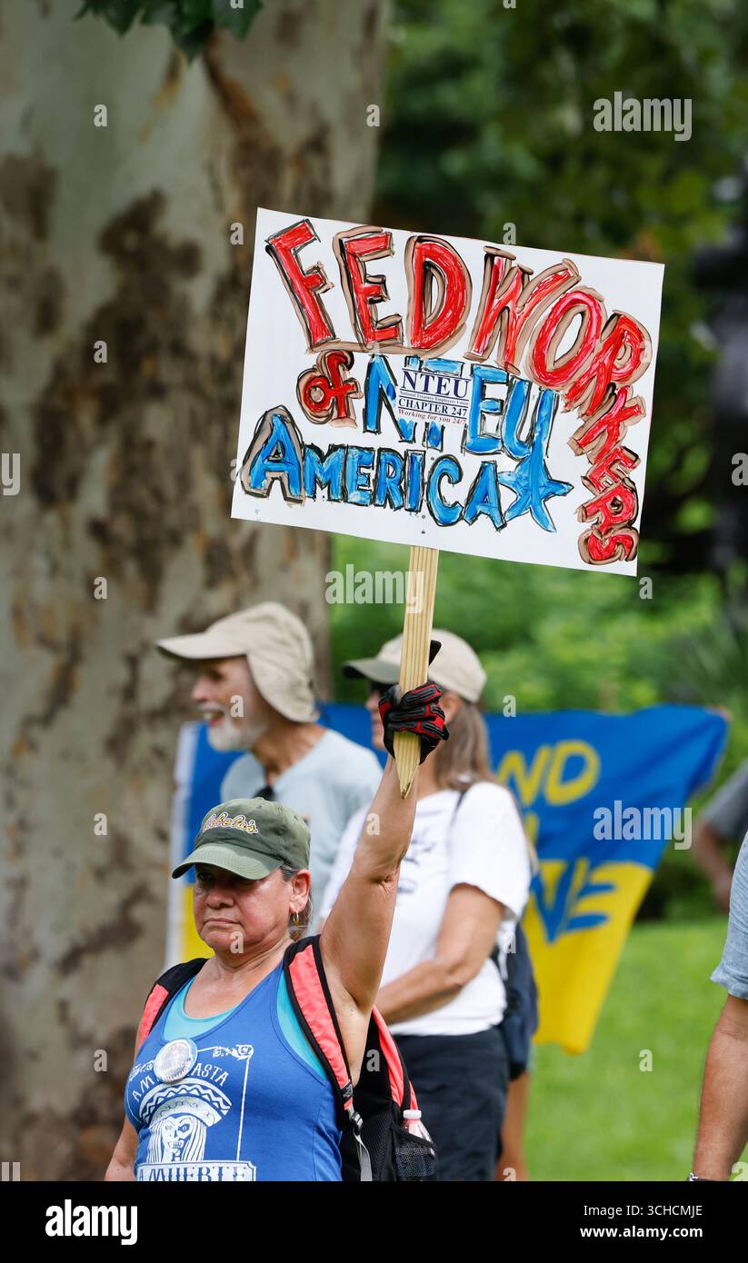 Hundreds gathered to protest President Donald Trump during the Memorial ...