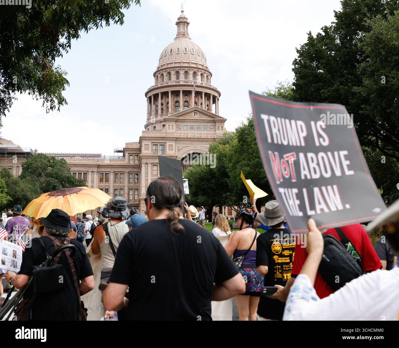 Hundreds gathered to protest President Donald Trump during the Memorial ...