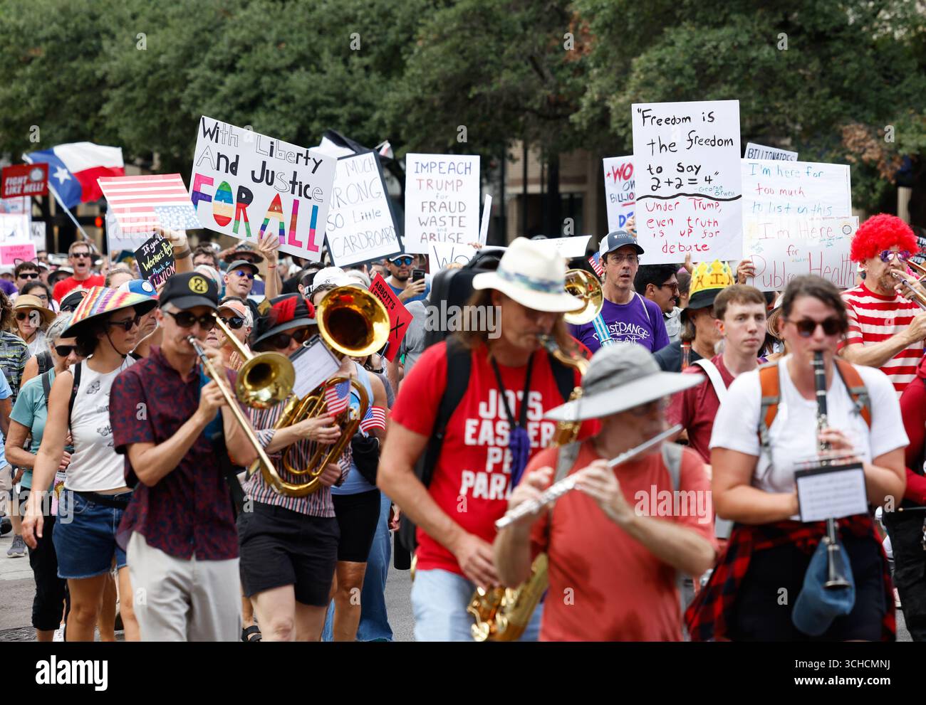Hundreds gathered to protest President Donald Trump during the Memorial ...
