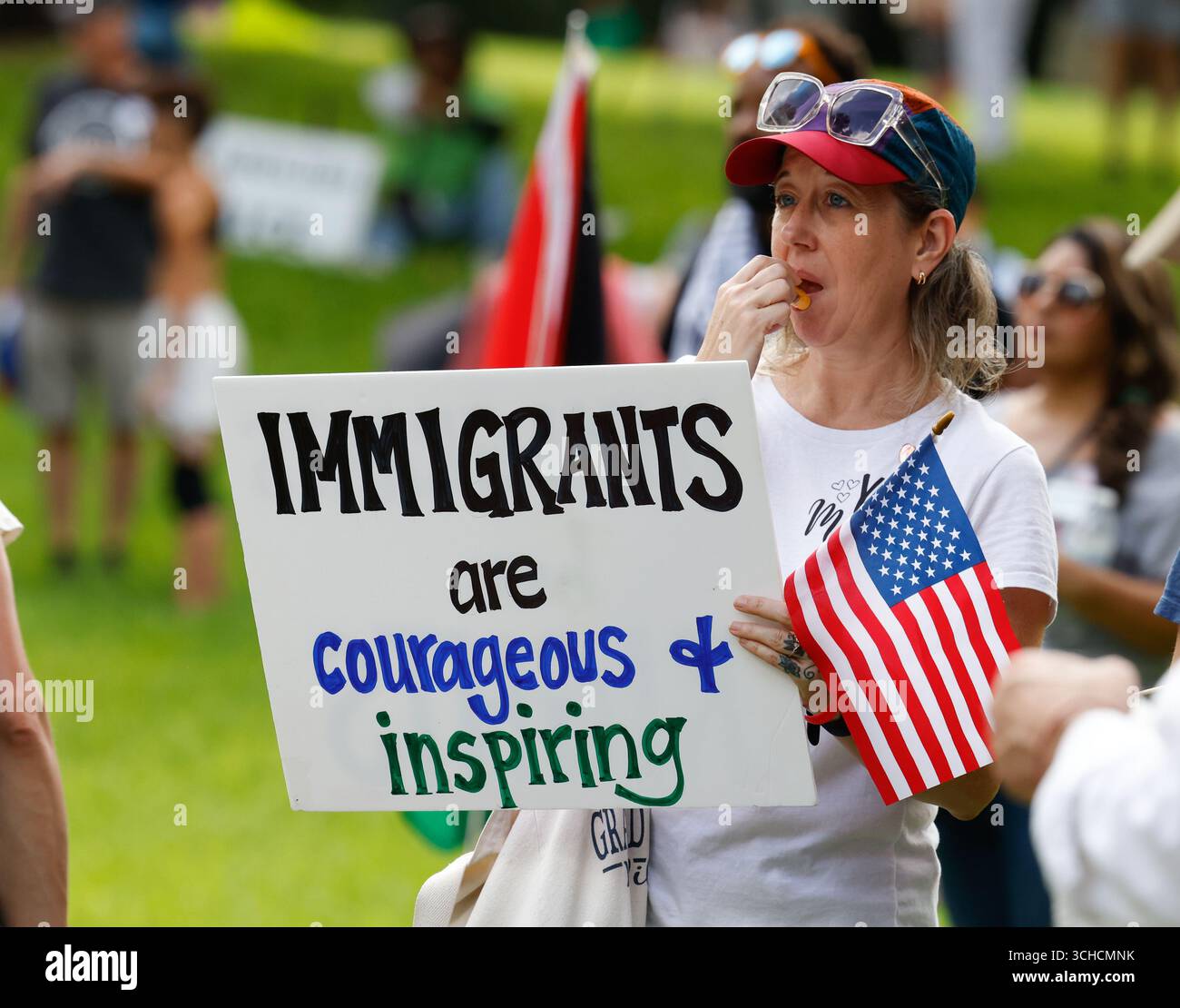 Hundreds gathered to protest President Donald Trump during the Memorial ...
