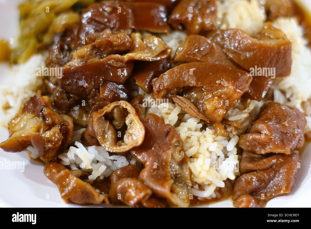 Stewed pork intestines in brown sauce with rice, classic Thai street ...