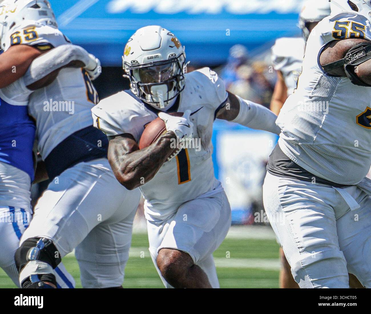 August 30, 2025: Toledo RB Chip Trayanum (1) finds a hole to run ...
