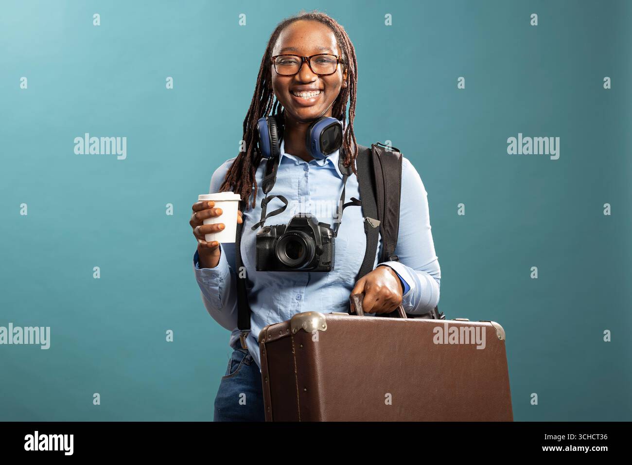 Joyful female traveler poses hi-res stock photography and images - Alamy