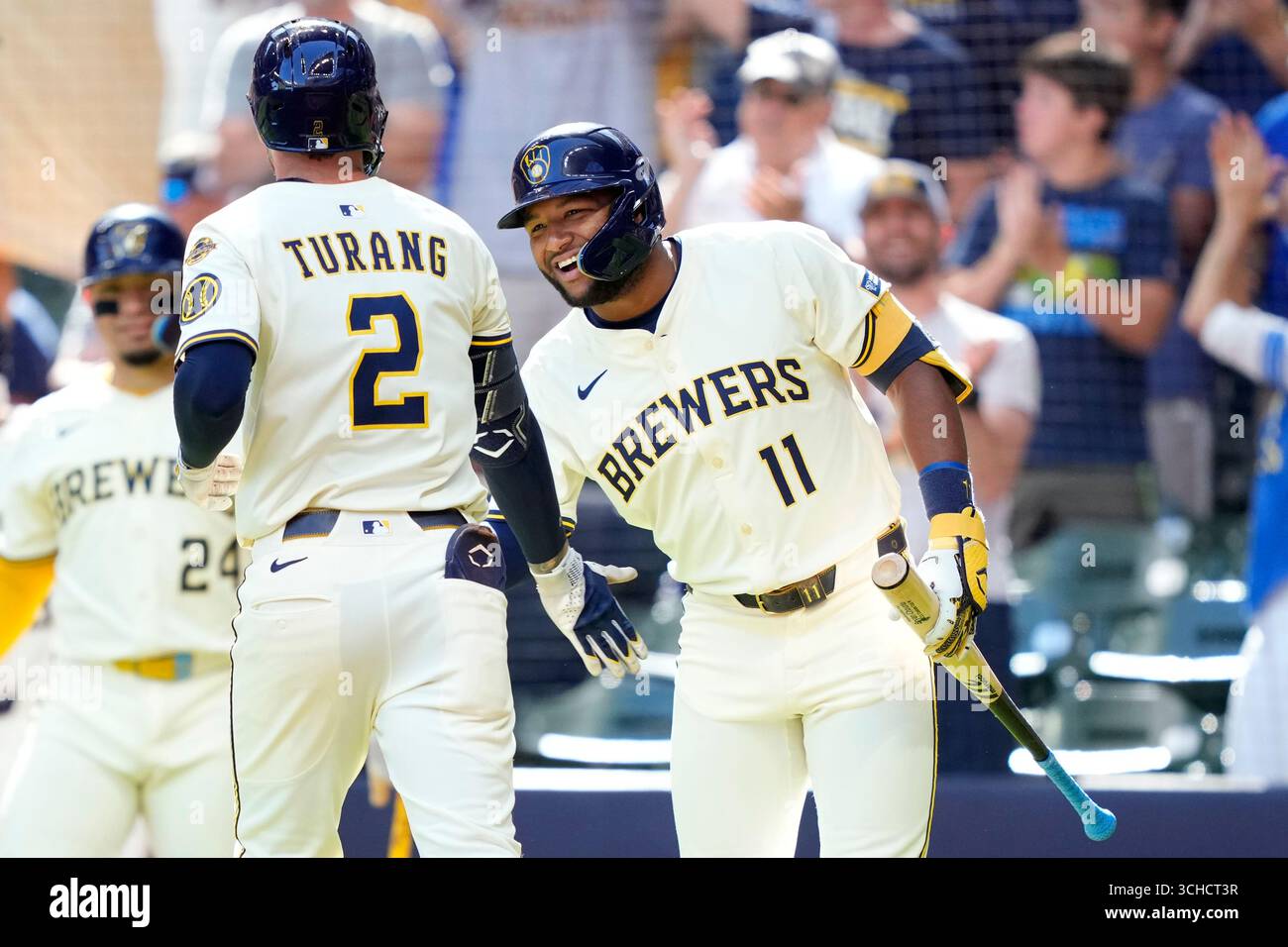 Milwaukee Brewers' Brice Turang (2) celebrates with Jackson Chourio (11 ...
