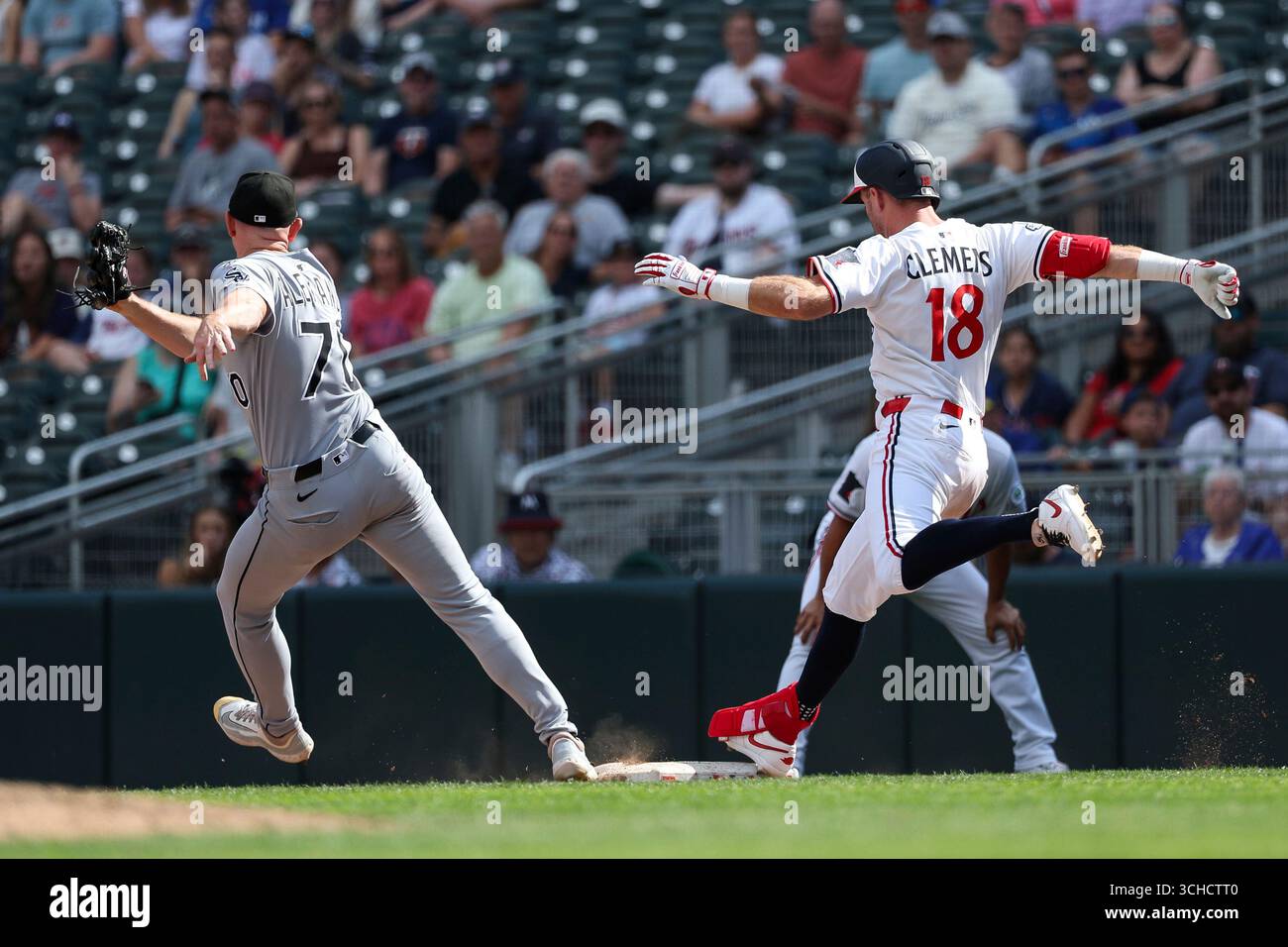 Chicago White Sox relief pitcher Tyler Alexander, left, forces out ...