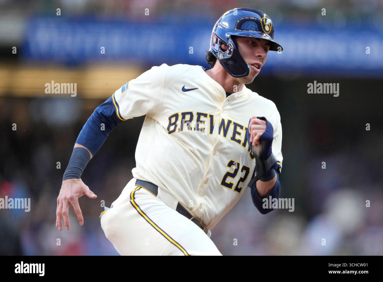 Milwaukee Brewers' Christian Yelich rounds third base on his way to ...