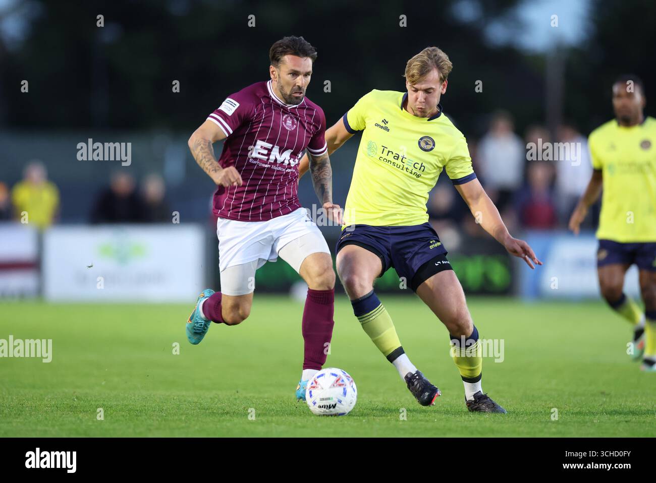 Ricky Holmes,of Chelmsford City, under pressure by a Fanborough player ...