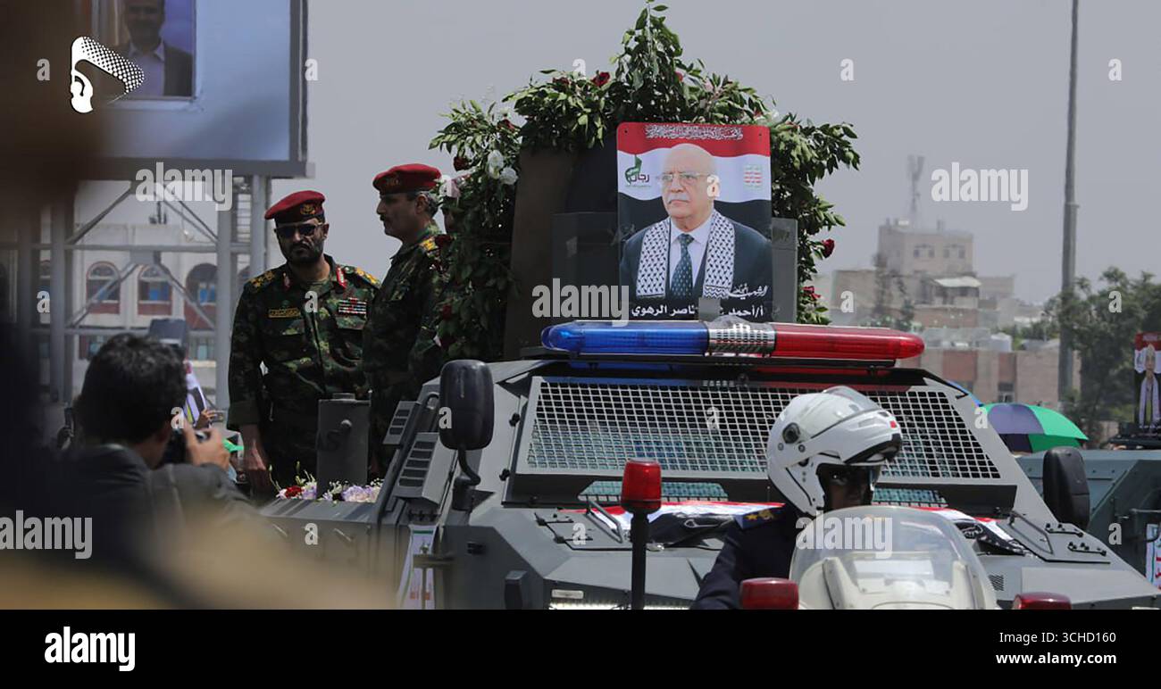 Yemeni honor guard carry the coffins of Prime Minister of Yemen's ...