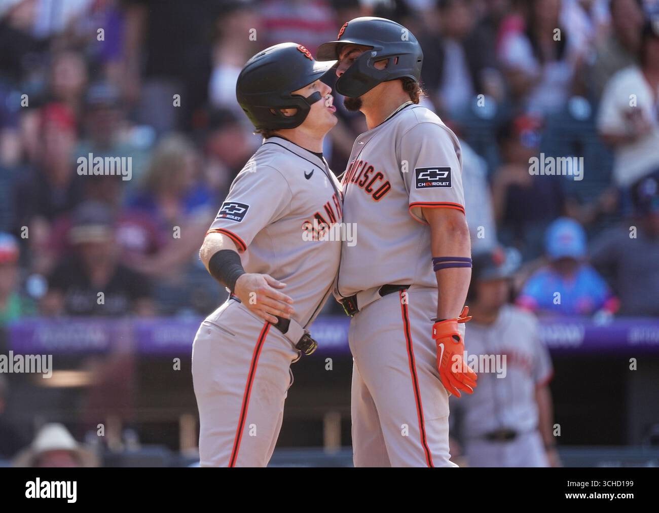San Francisco Giants' Drew Gilbert, left, congratulates Willy Adames ...