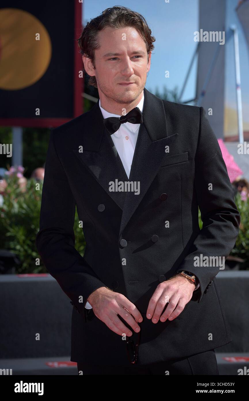 VENICE, ITALY - SEPTEMBER 01: Lewis Pullman signs autographs as she ...