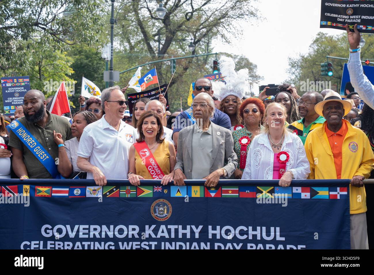 Governor Kathy Hochul and Reverend Al Sharpton among others walk West ...