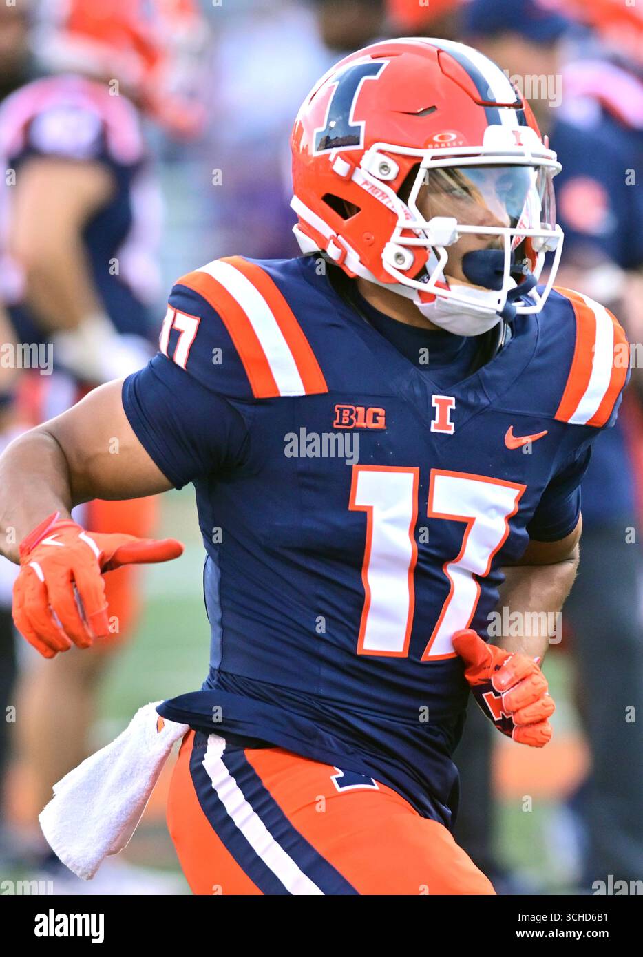 CHAMPAIGN, IL - AUGUST 29: Illinois wide receiver Collin Dixon (17) warms up before a college ...