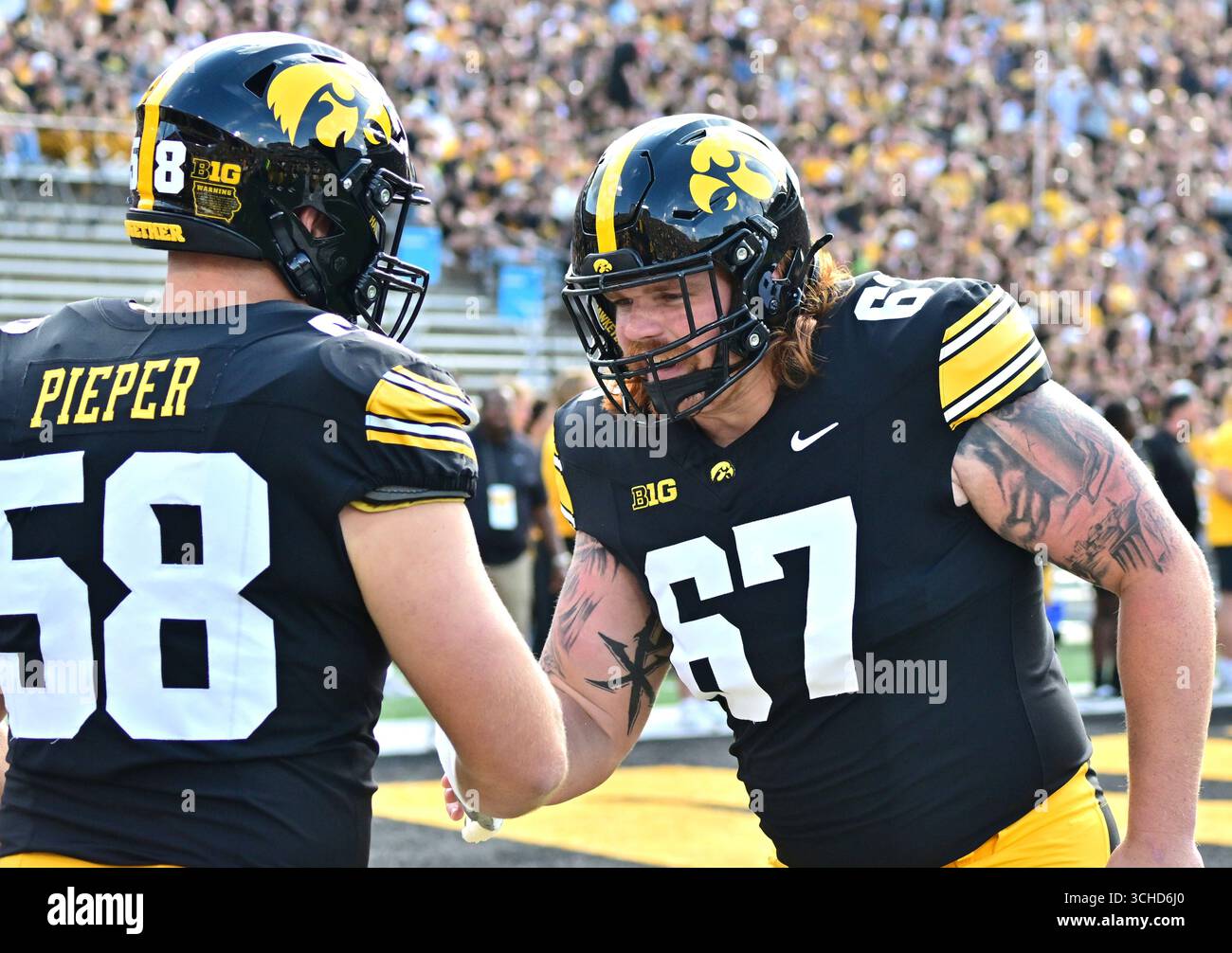 IOWA CITY, IA - AUGUST 30: Iowa right guard Kade Pieper (58) and Iowa ...