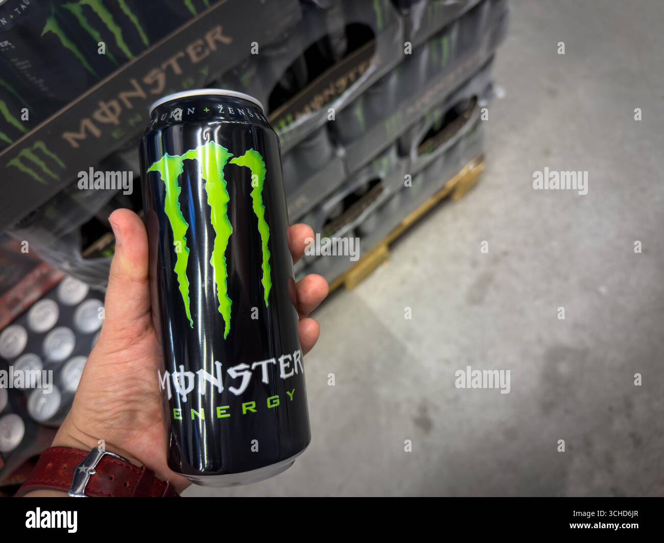 BELGRADE, SERBIA - AUGUST 9, 2025:Monster Energy can on a supermarket ...