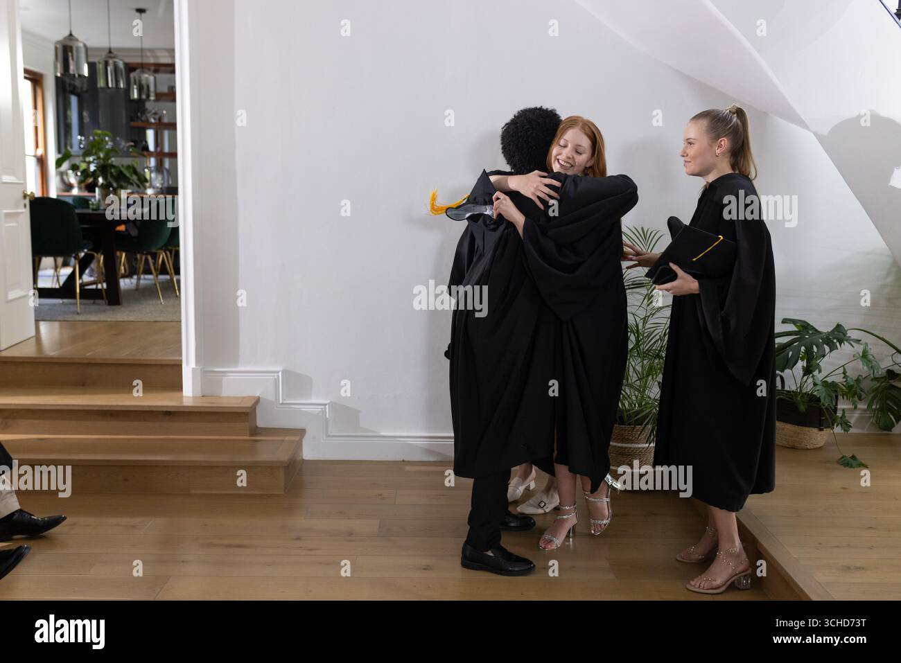 Family celebrating teens graduation hi-res stock photography and images ...