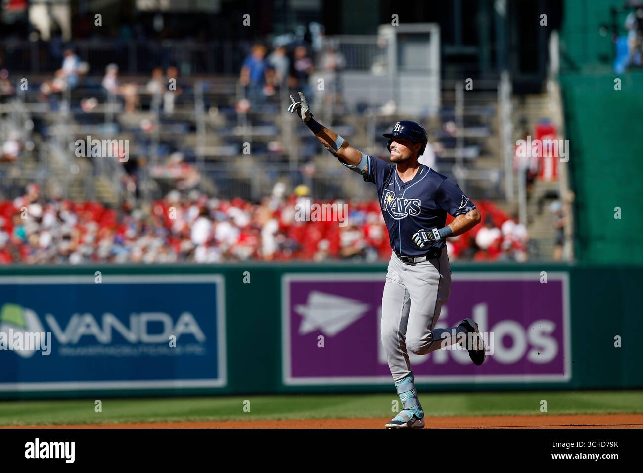 Tampa Bay Rays' Josh Lowe gestures as he runs the bases after hitting a ...