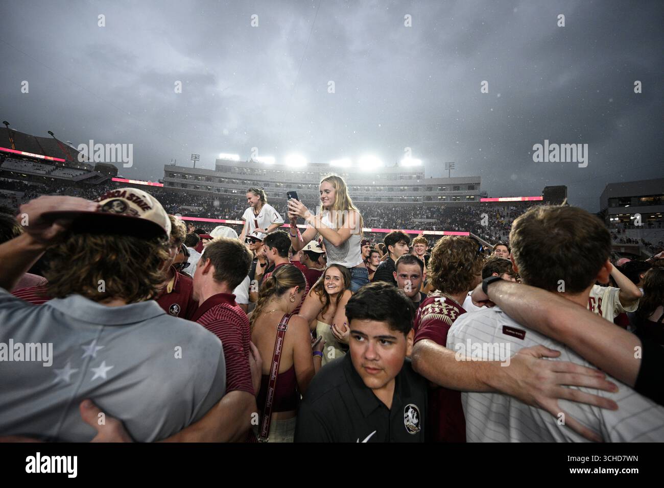 Florida State fans celebrate on the field after a win against Alabama ...