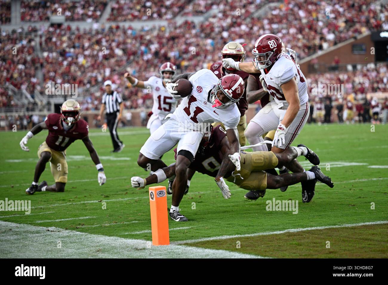 Alabama wide receiver Rico Scott (11) scores a six-yard touchdown on a ...